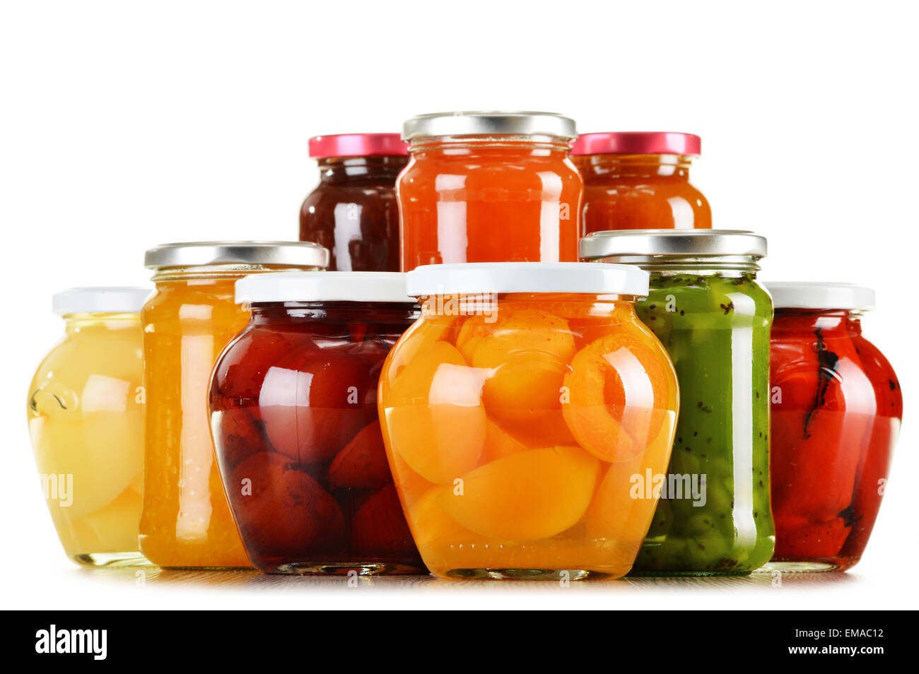 Jars with fruity compotes and jams isolated on white background ...