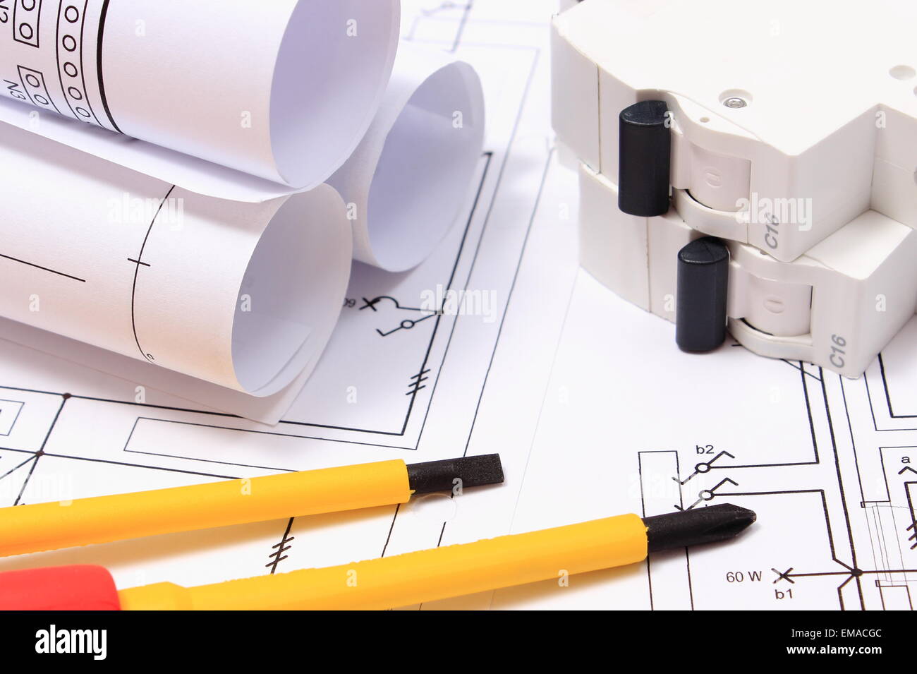Screwdriver, work tools, rolls of electrical diagrams and electric fuse ...