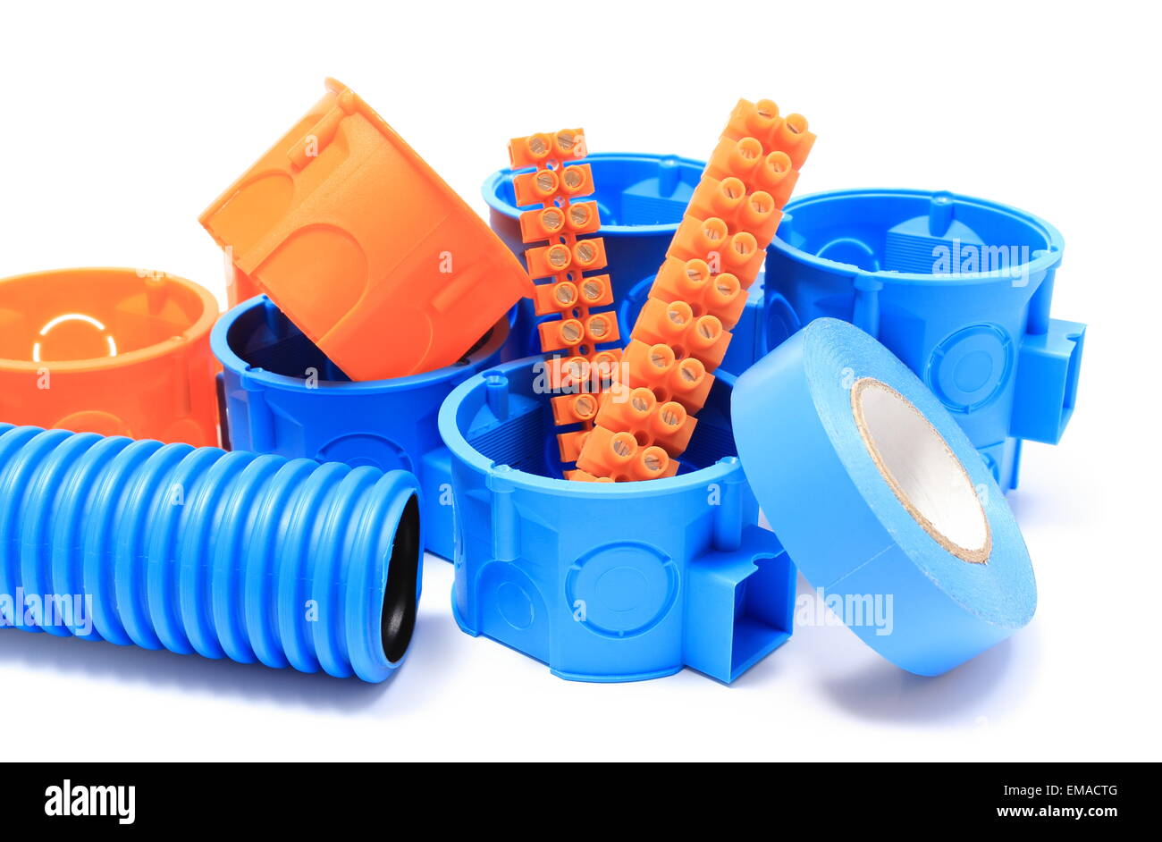Orange and blue electrical boxes with components for use in electrical ...