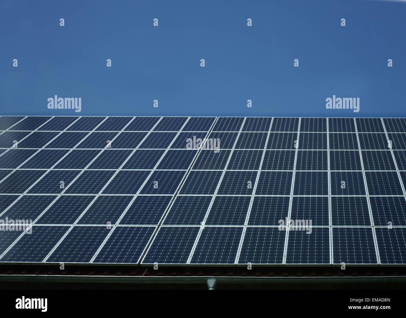 solar panels on house roof on sky background Stock Photo - Alamy