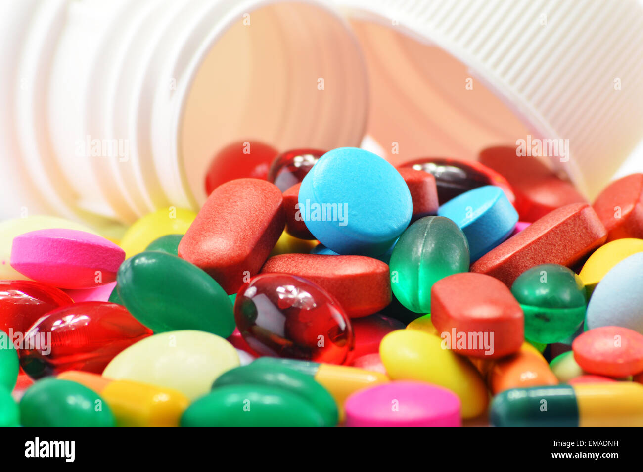 Composition with variety of drug pills and container Stock Photo - Alamy