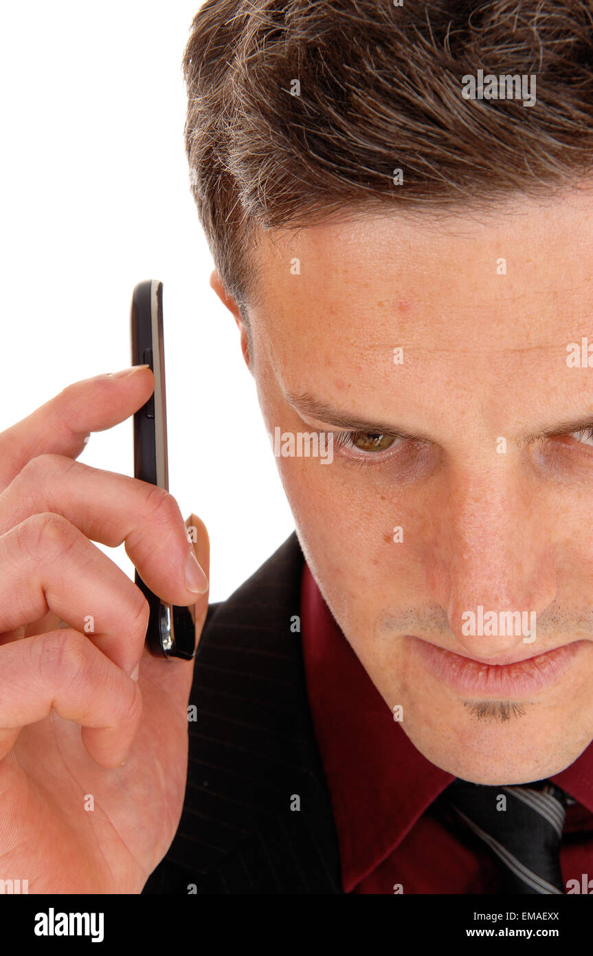 A closeup shoot of a man from the front holding his cell phone on his ...