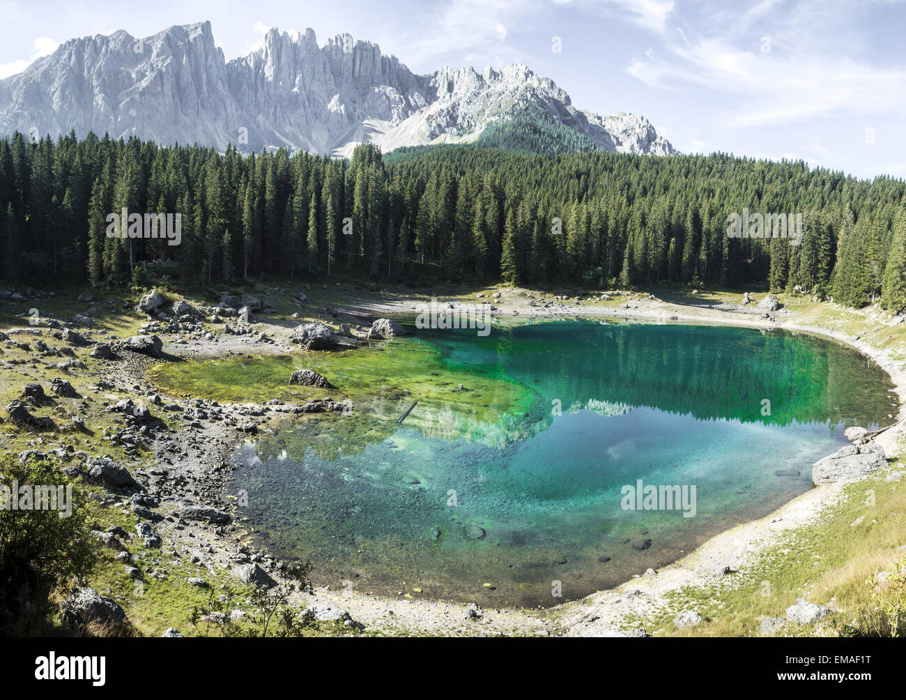landscape and reflections in the famous lake of Carezza - Dolomites ...