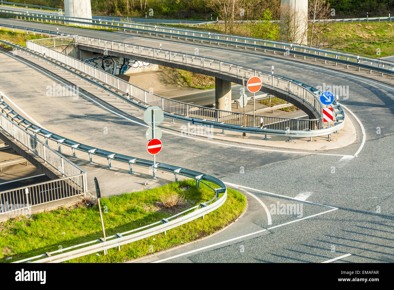 Highway with junction and many traffic signs Stock Photo - Alamy