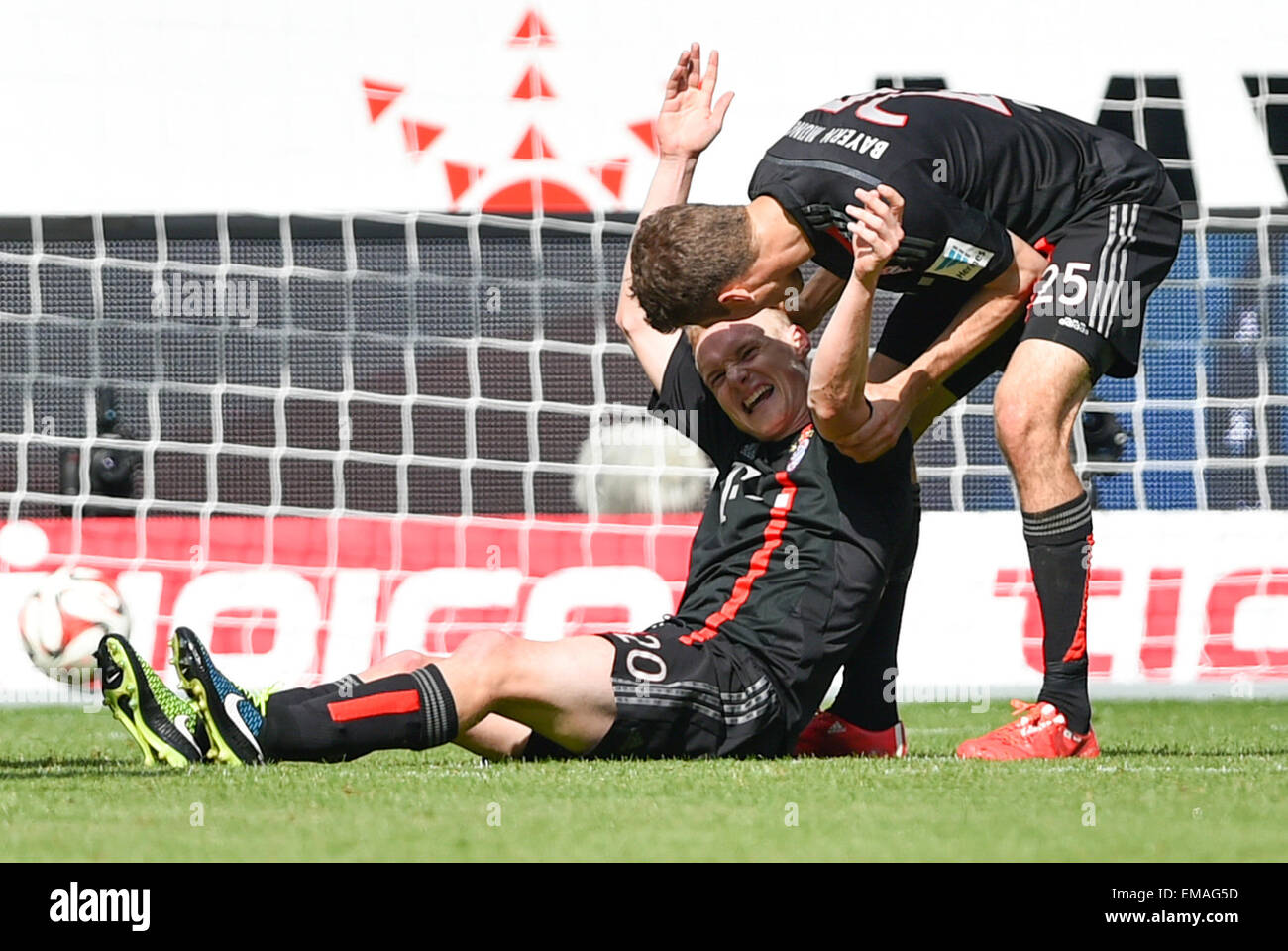 Sinsheim, Germany. 18th Apr, 2015. Munich's Sebastian Rode (l ...
