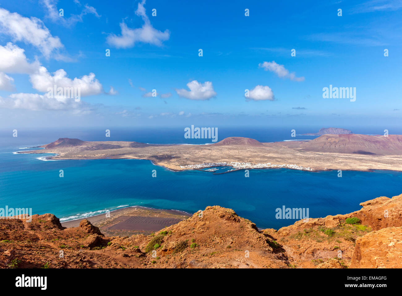 The Island of La Graciosa and the port of Caleta del Sebo taken from ...