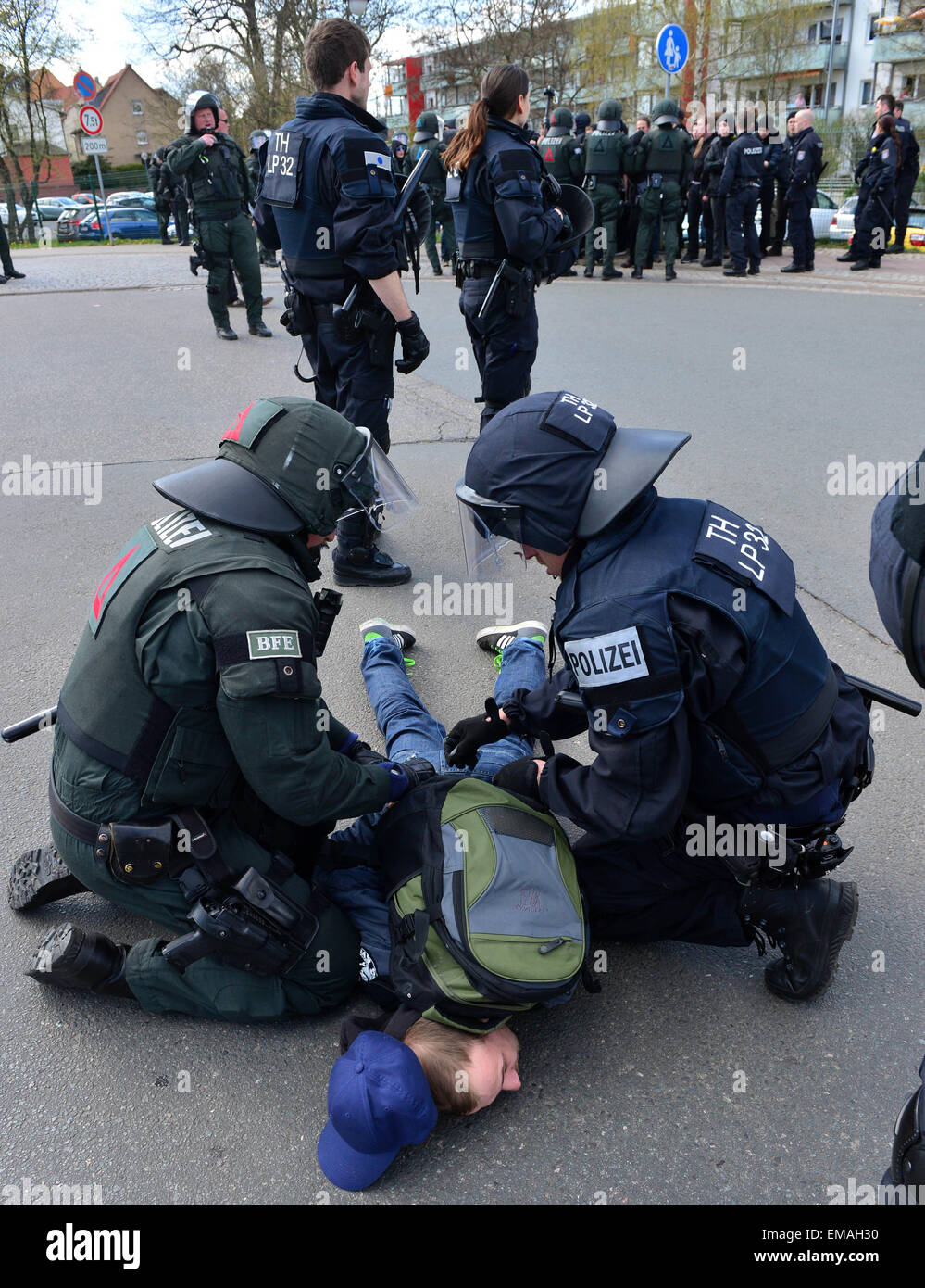 Handcuffed protestor hi-res stock photography and images - Alamy