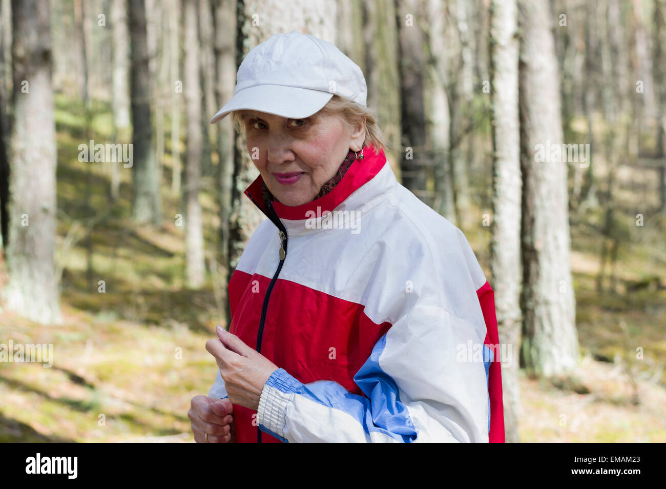 Senior female jogging Stock Photo - Alamy