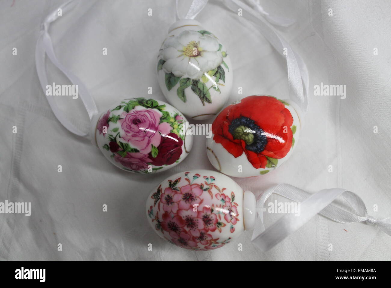 beautiful enamel eggs on silk ribbons decoration for Easter for ...