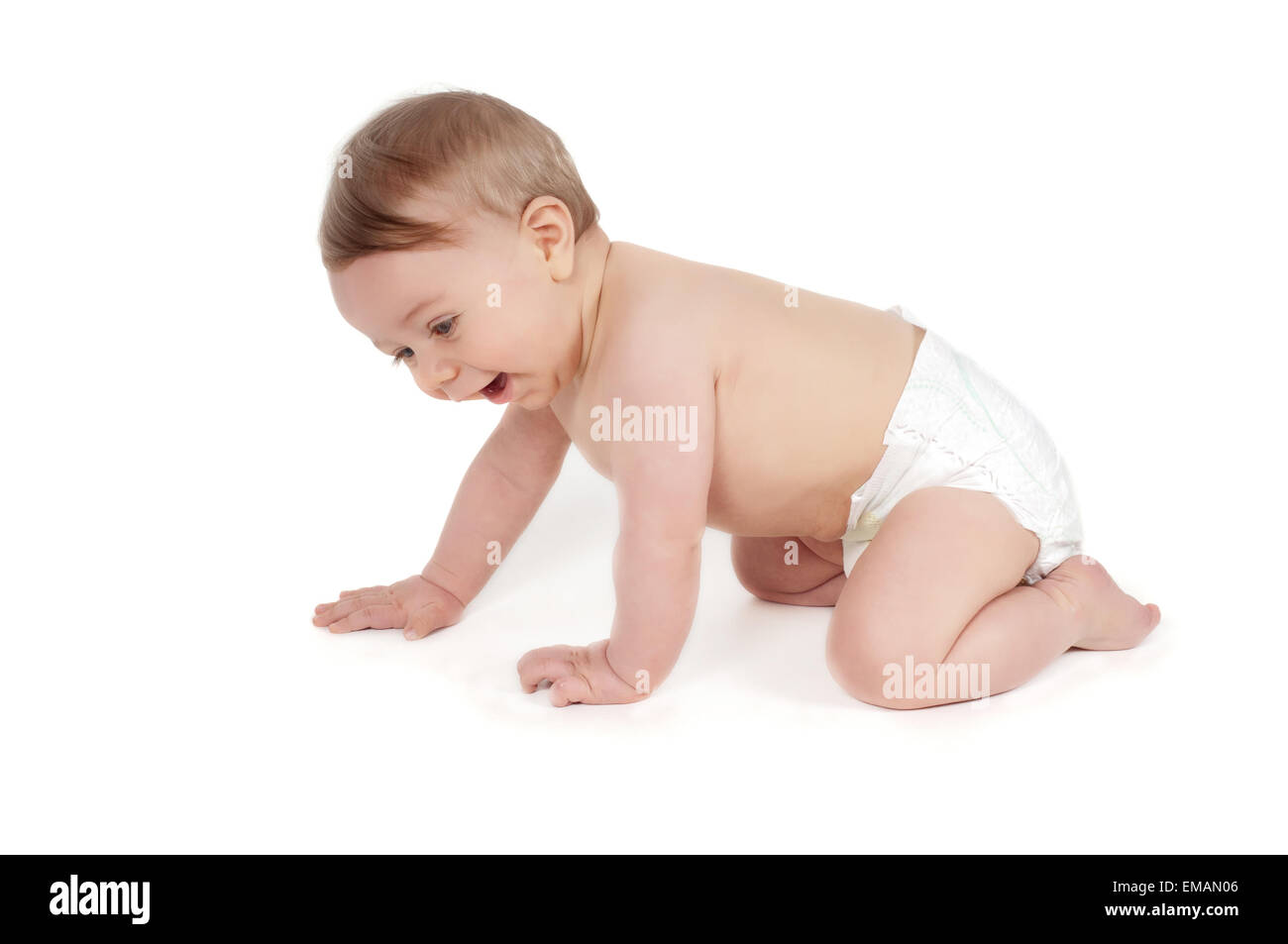 Side view of pretty crawling baby Stock Photo - Alamy