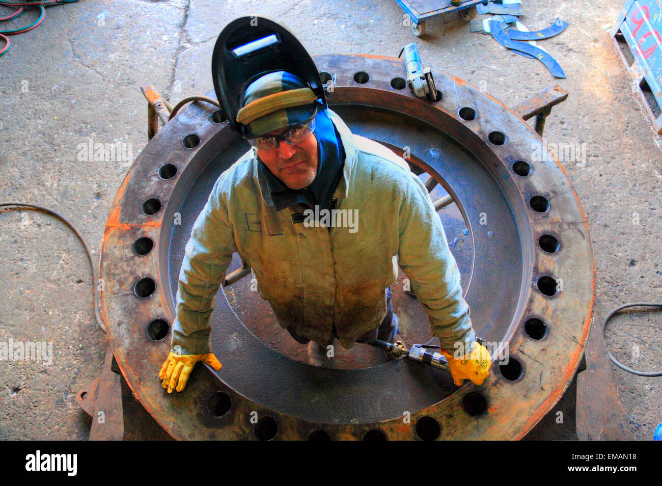 Welding workers at Demarchi Island Port, River Plate Coast. Buenos ...