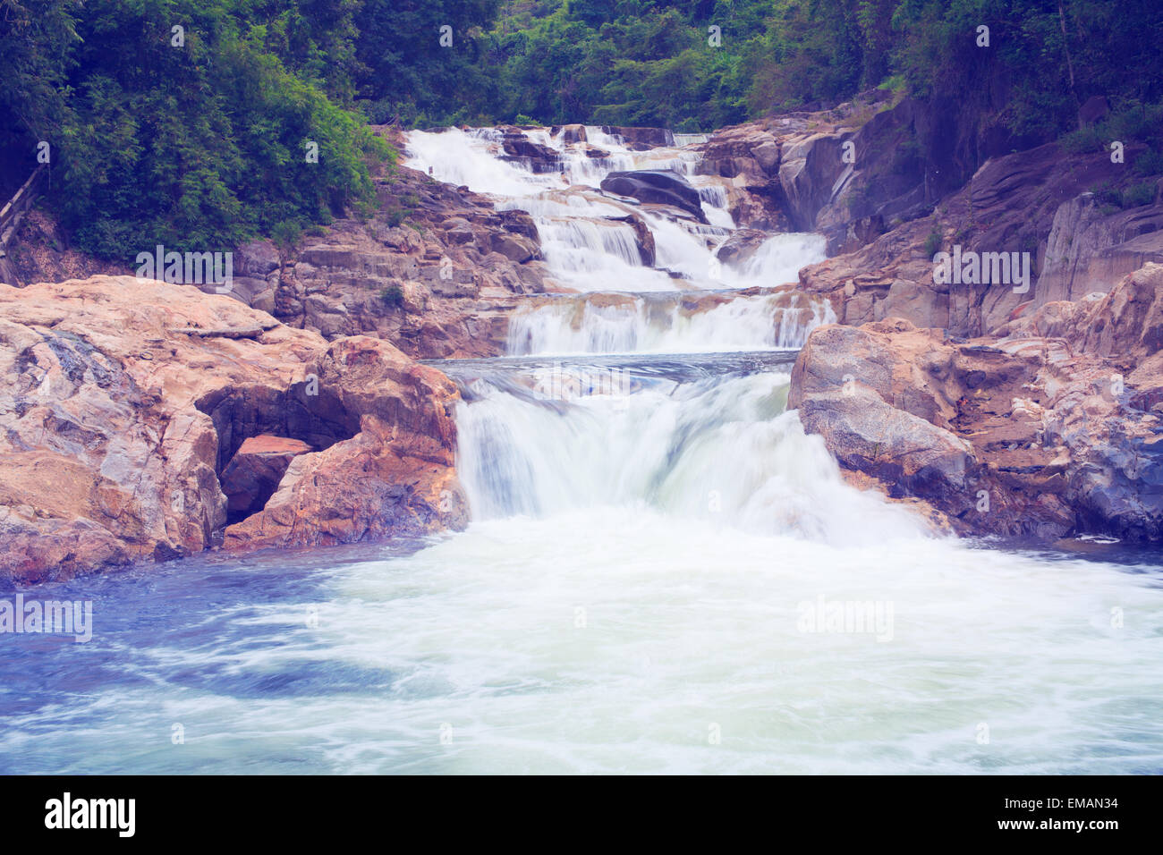 Yang bay waterfall in tropical forest. Vietnam Stock Photo - Alamy
