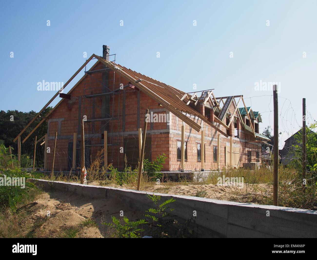 building of house on forest and sky background Stock Photo - Alamy