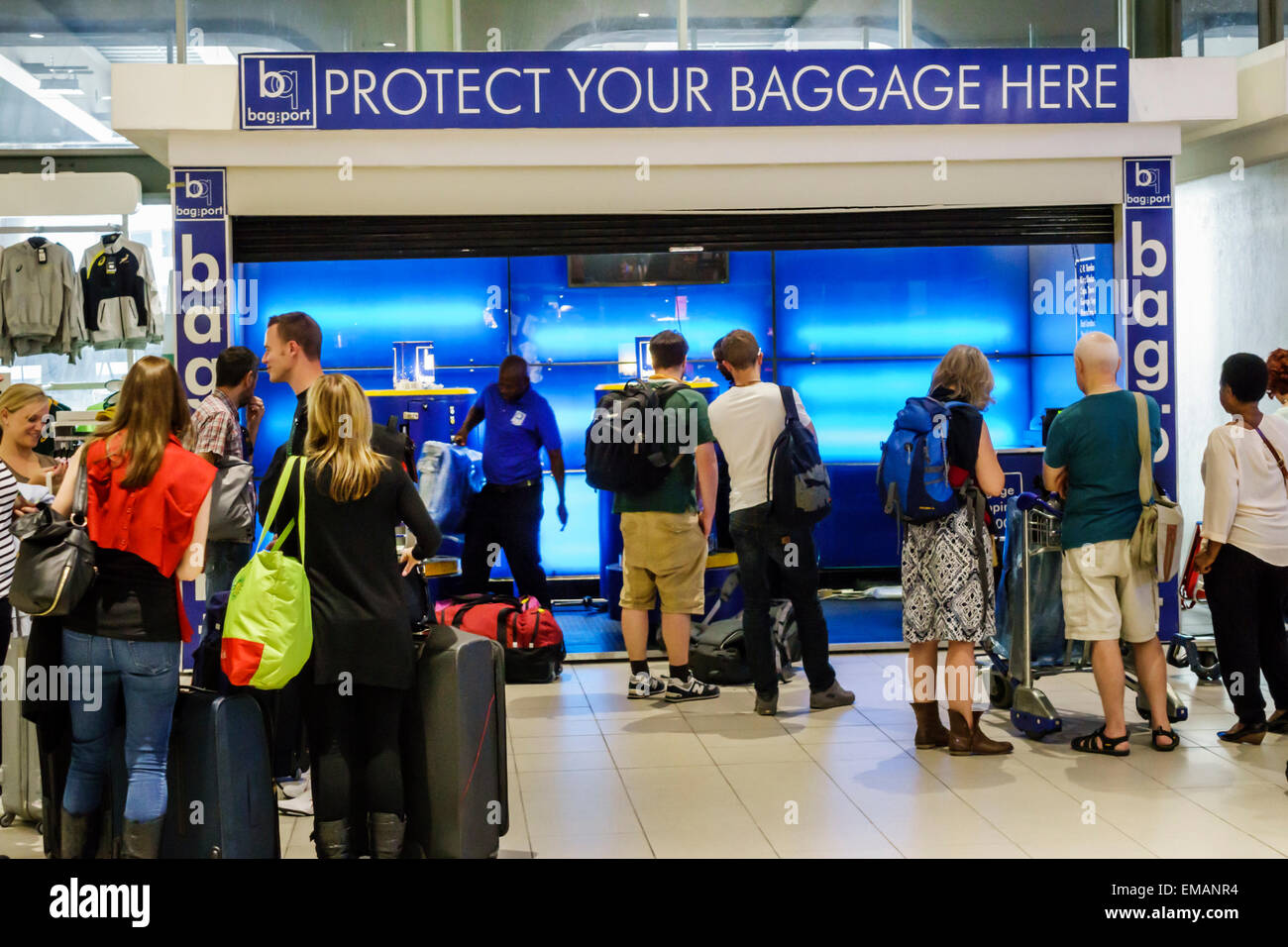 Baggage wrapping service hi-res stock photography and images - Alamy
