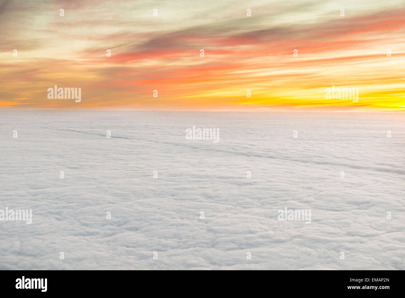 Flying above clouds sunrise hi-res stock photography and images - Alamy