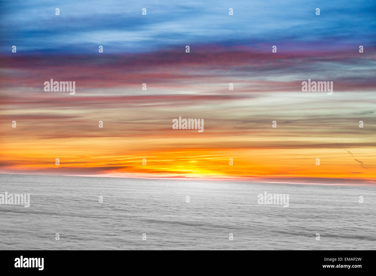 Flying above clouds sunrise hi-res stock photography and images - Alamy