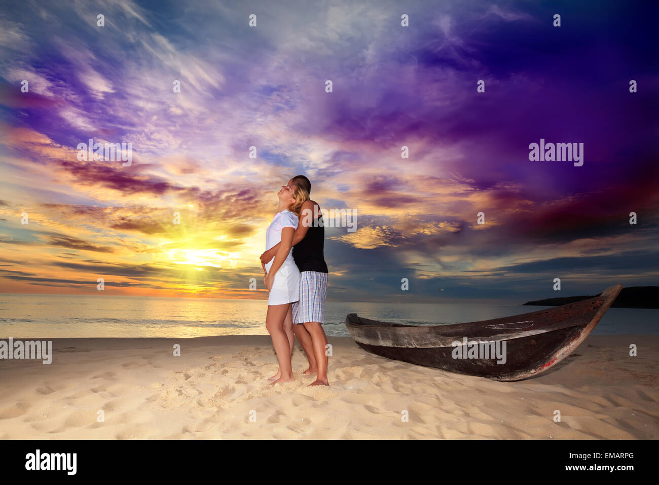 Romantic couple at uninhabited island at sunrise time Stock Photo - Alamy