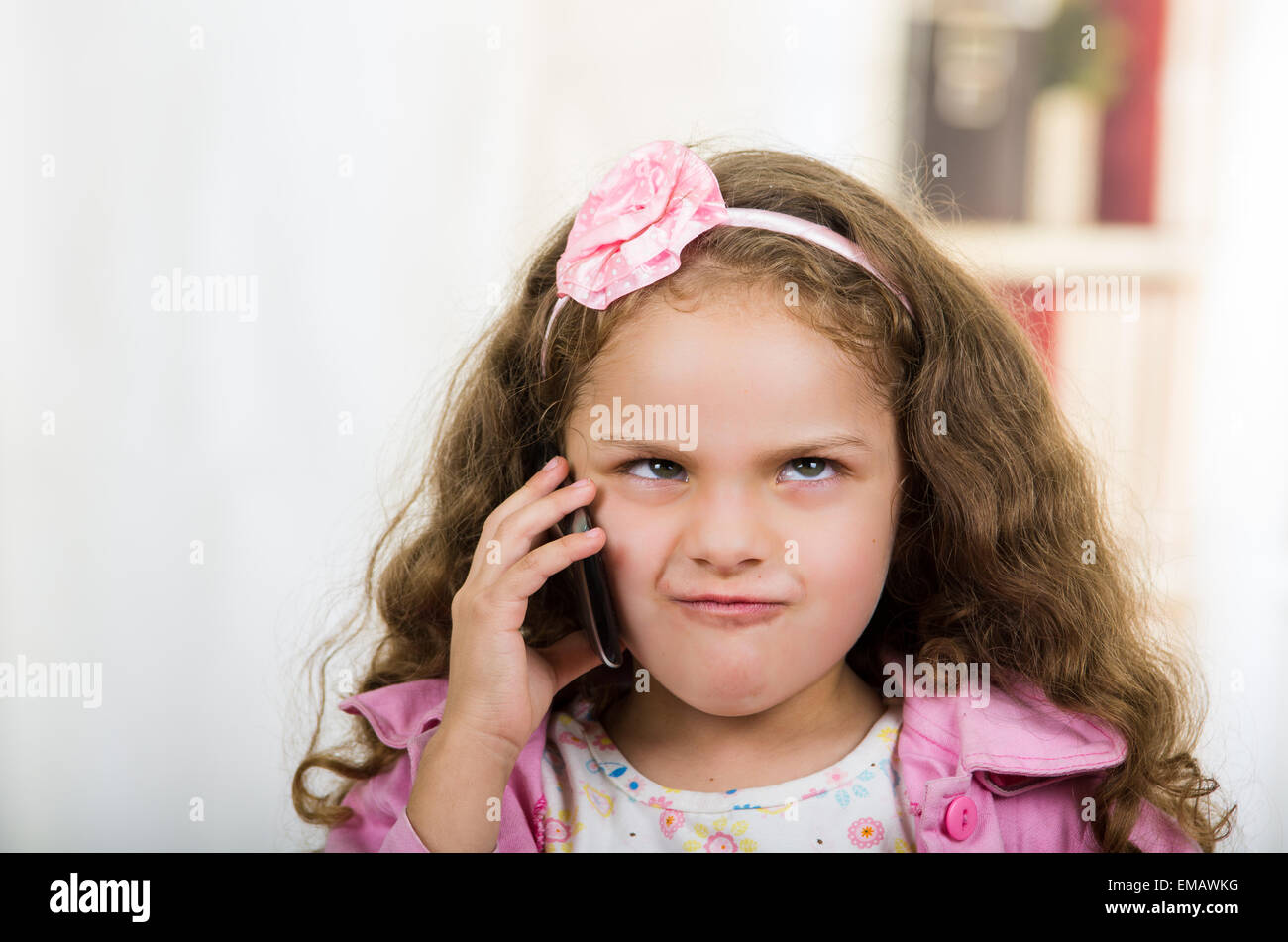 cute little girl using cell phone Stock Photo - Alamy