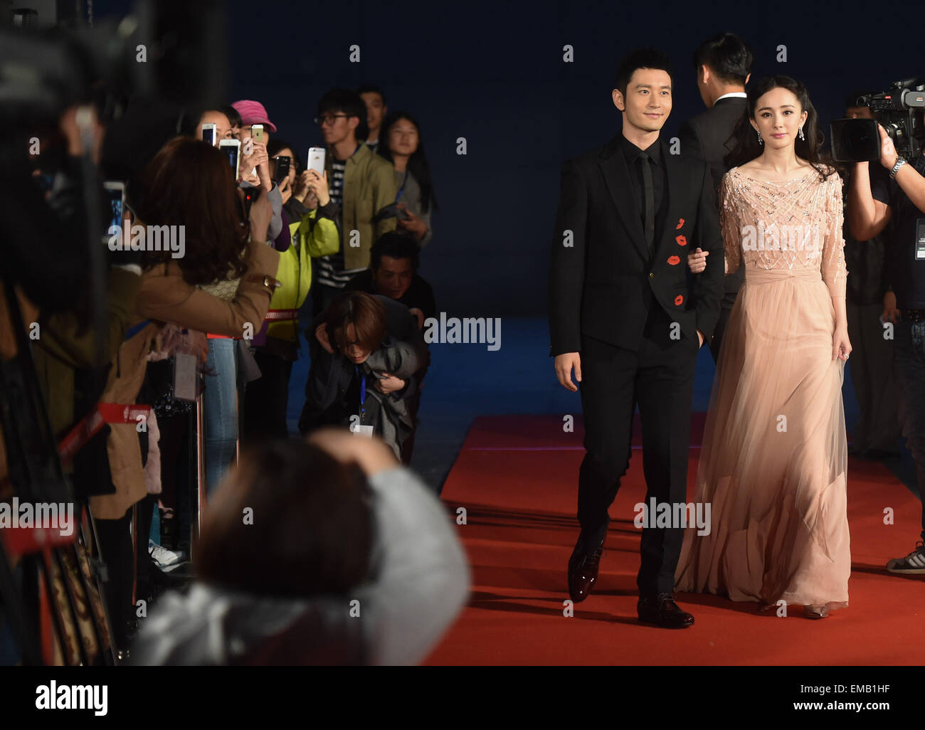 Beijing, China. 18th Apr, 2015. Actor Huang Xiaoming (L) and actress ...