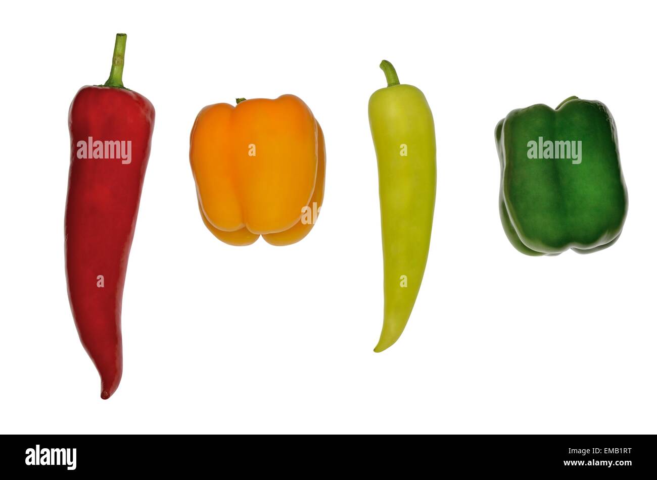 Four different type and different colors of peppers, on white ...