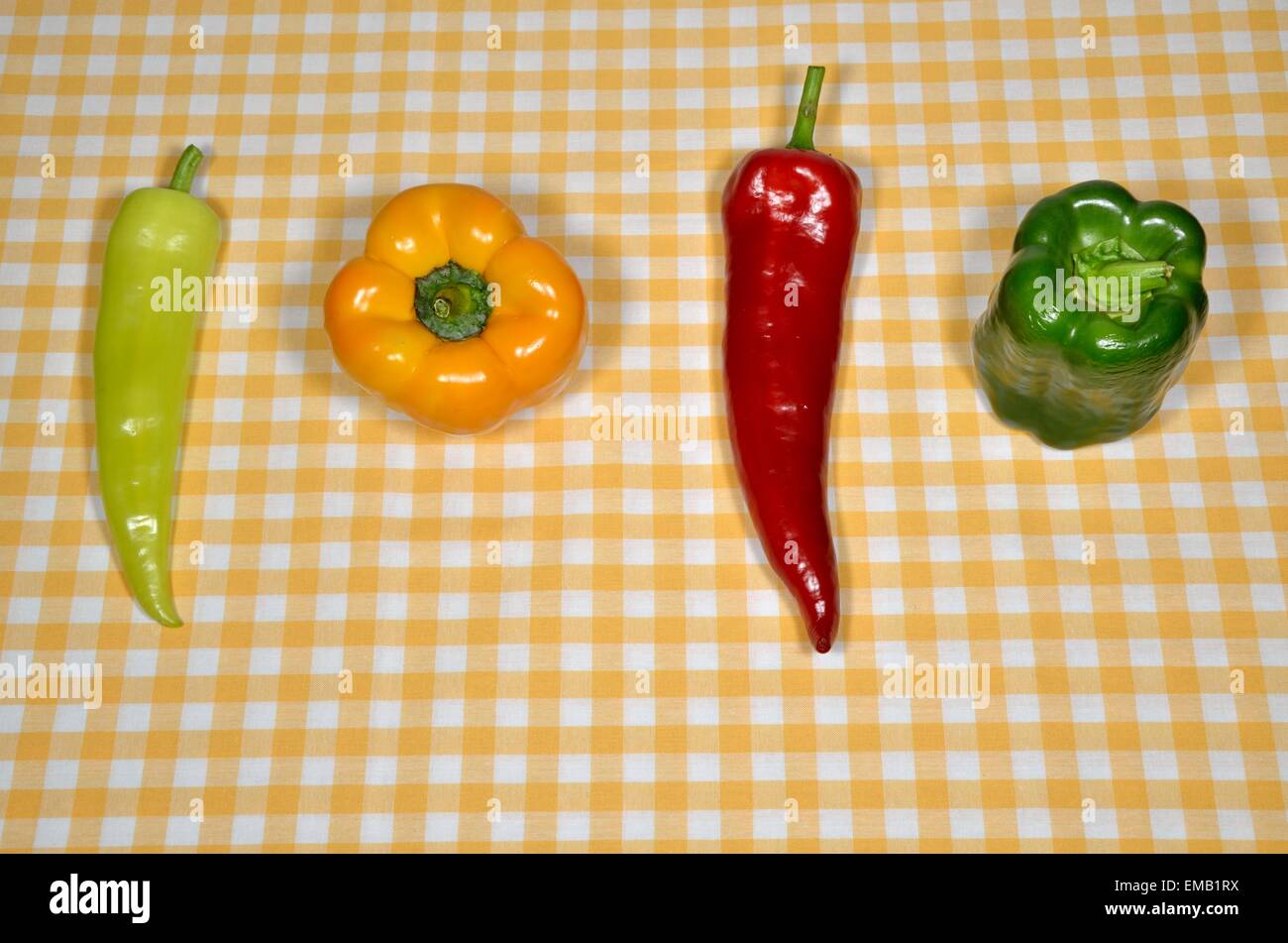 Four different type and different colors of peppers Stock Photo - Alamy