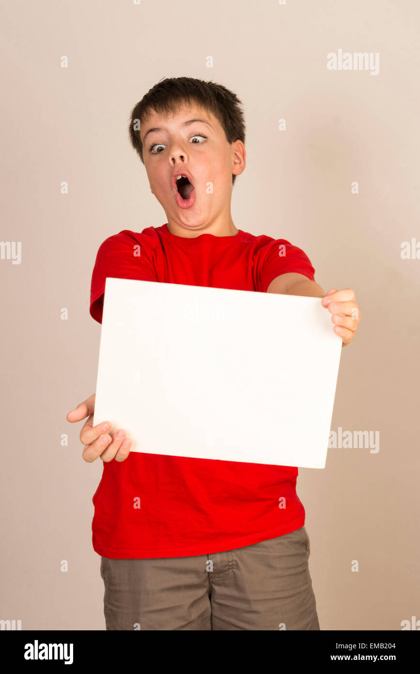 Boy holding blank sign hi-res stock photography and images - Alamy