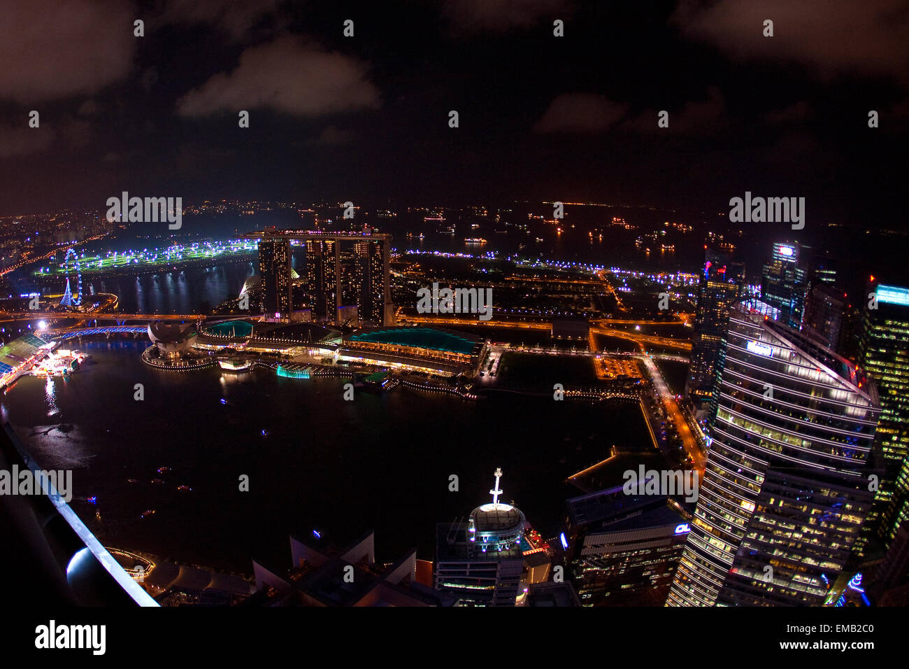 SINGAPORE, FEBRUARY 13 - Wide angle night time aerial view of Singapore ...