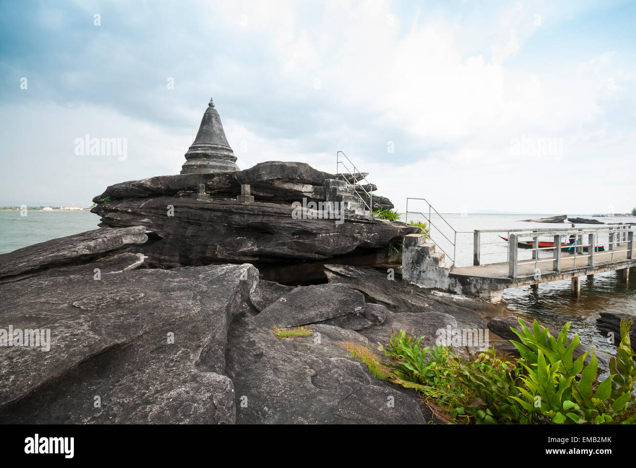 An ancient Buddhist rock pagoda on the Koh Kong river side in Cambodia ...