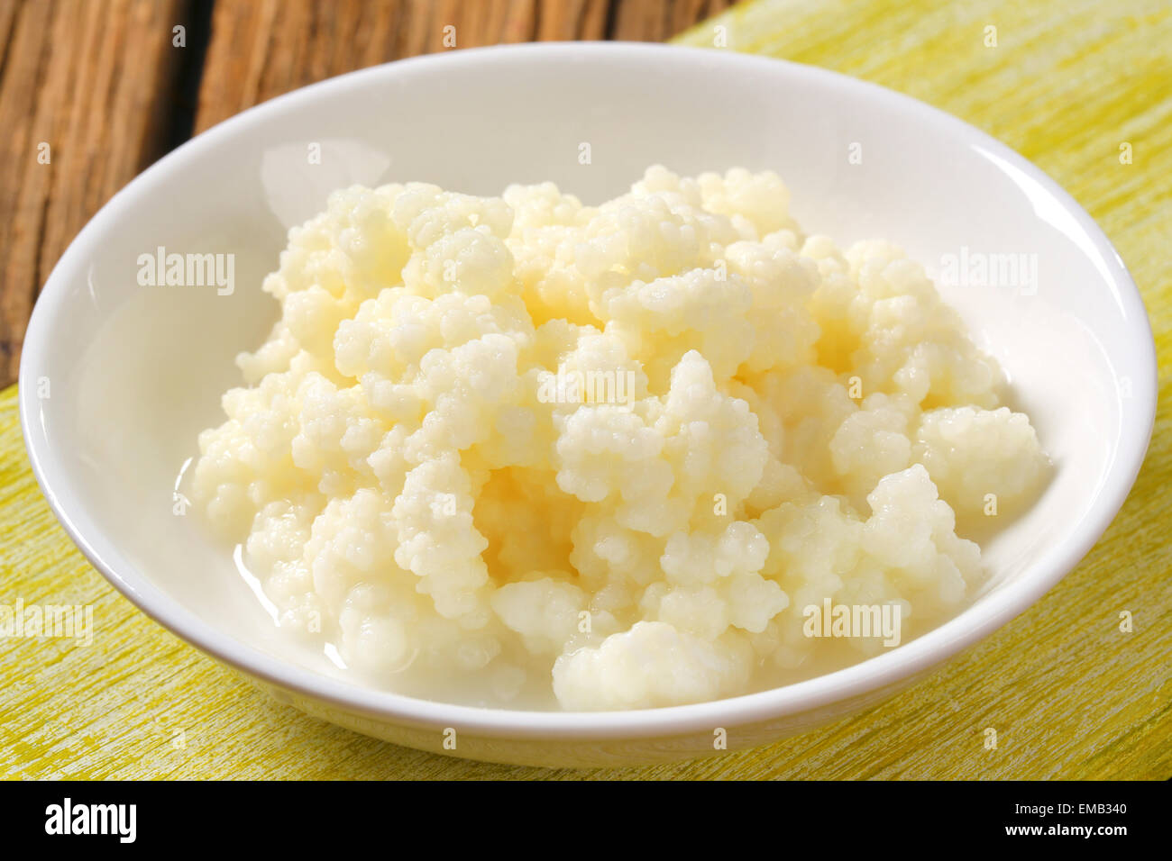 Organic probiotic milk kefir grains Stock Photo - Alamy
