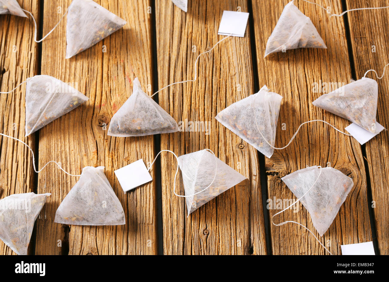 Jasmine tea bags on wood Stock Photo - Alamy