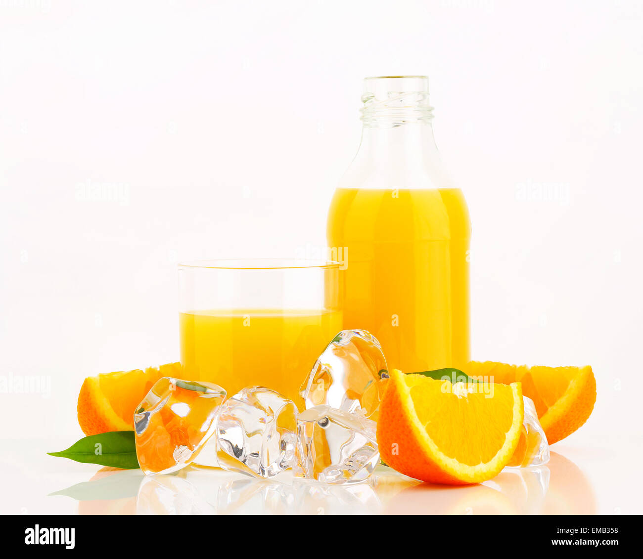 Fresh orange juice and ice Stock Photo - Alamy