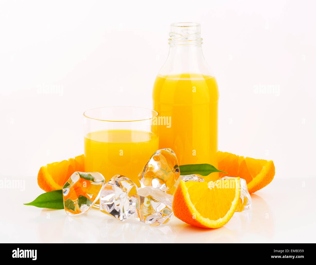 Fresh orange juice and ice Stock Photo - Alamy