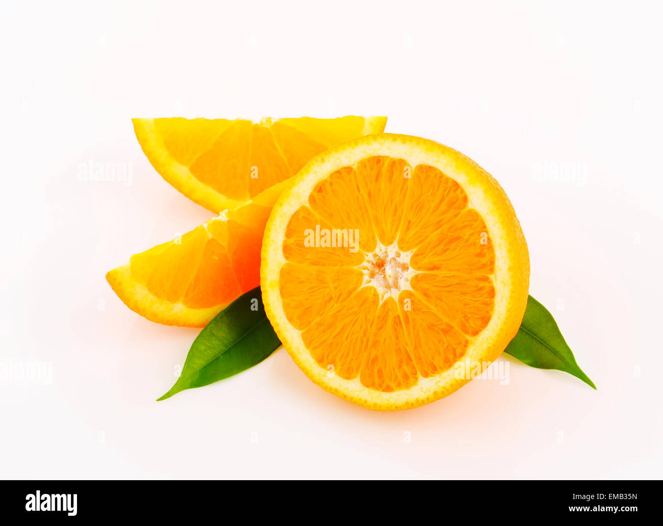 Cut orange fruit - half and wedges Stock Photo - Alamy