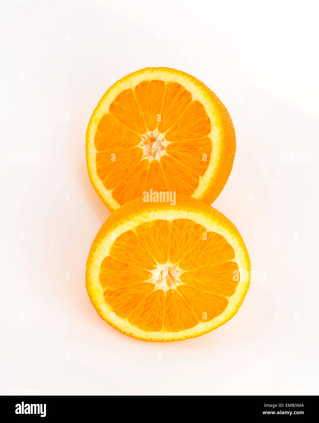 Studio shot of halved orange Stock Photo - Alamy