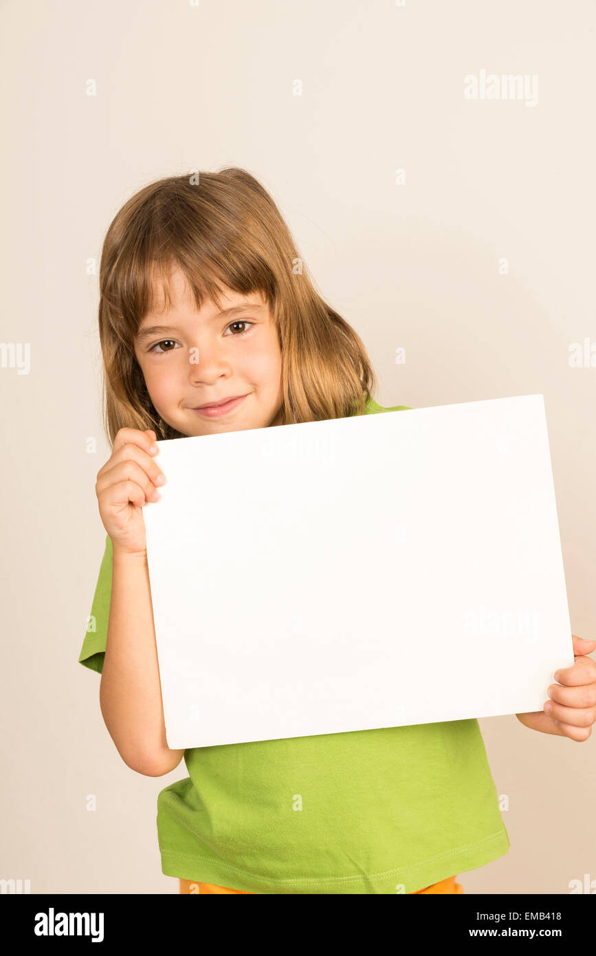 smiling girl carrying a poster Stock Photo - Alamy