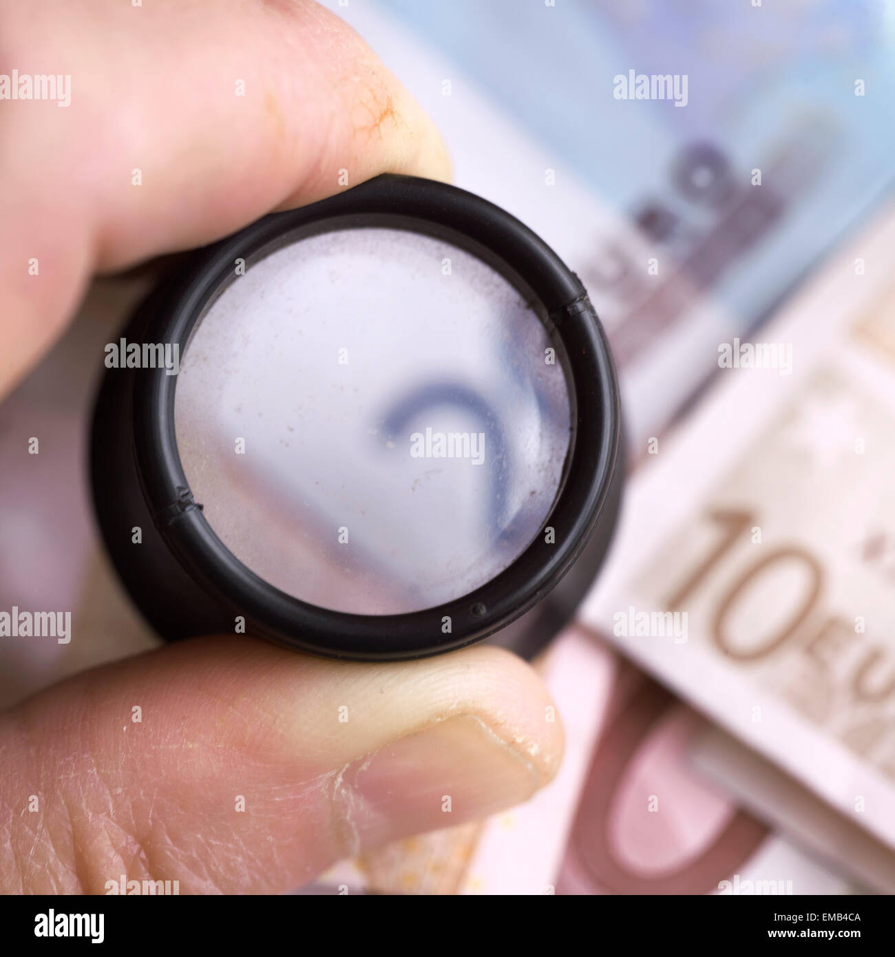 Euro magnifier hi-res stock photography and images - Alamy