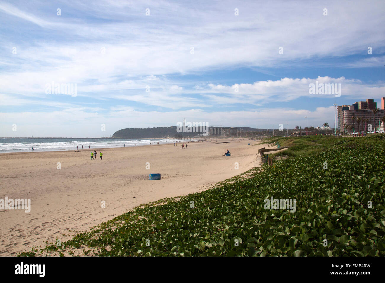 Many unknown beach goers on Addington beach in Durban, South Africa ...