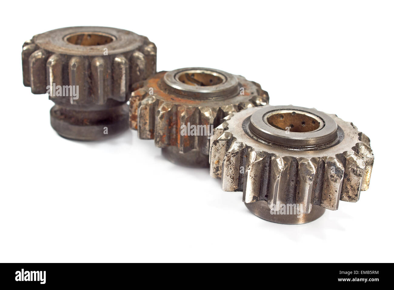 Old metal cogs isolated on white Stock Photo - Alamy