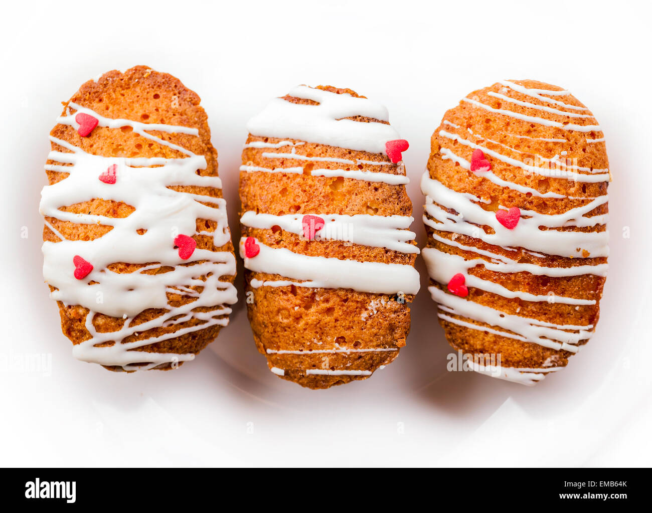 three fresh muffin closeup on a white background Stock Photo - Alamy