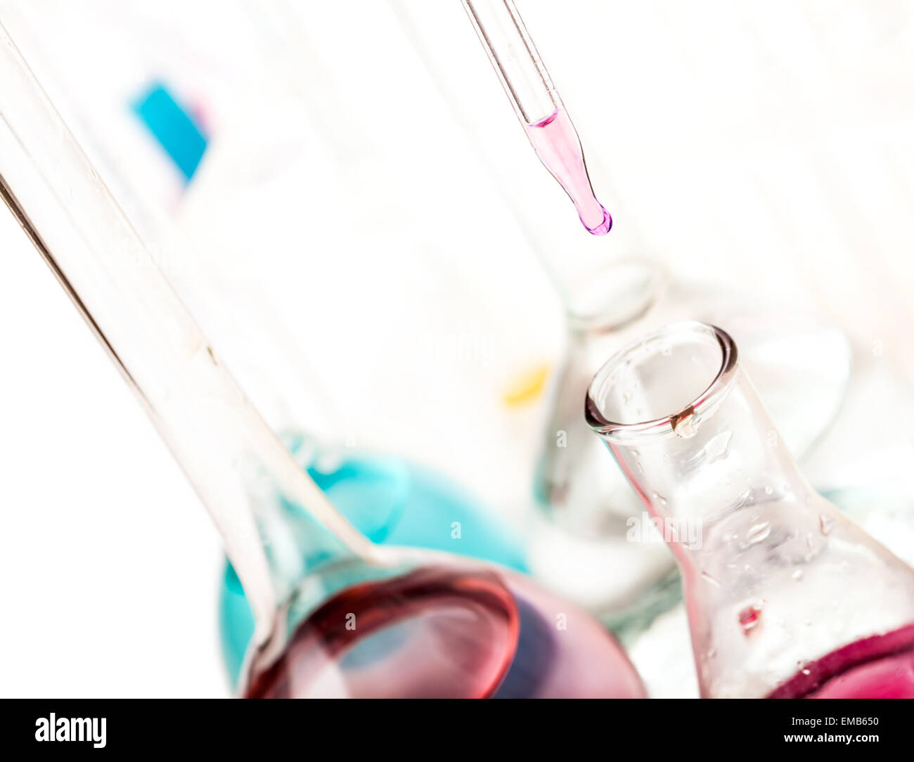 drop falls from the pipette in a flask on a light background Stock ...