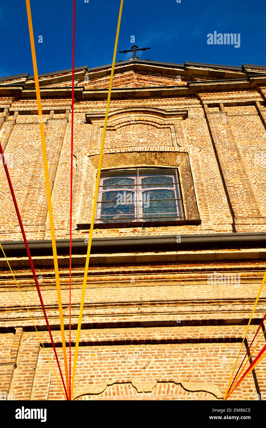 italy lombardy in the samarate old church closed brick tower wall rose ...