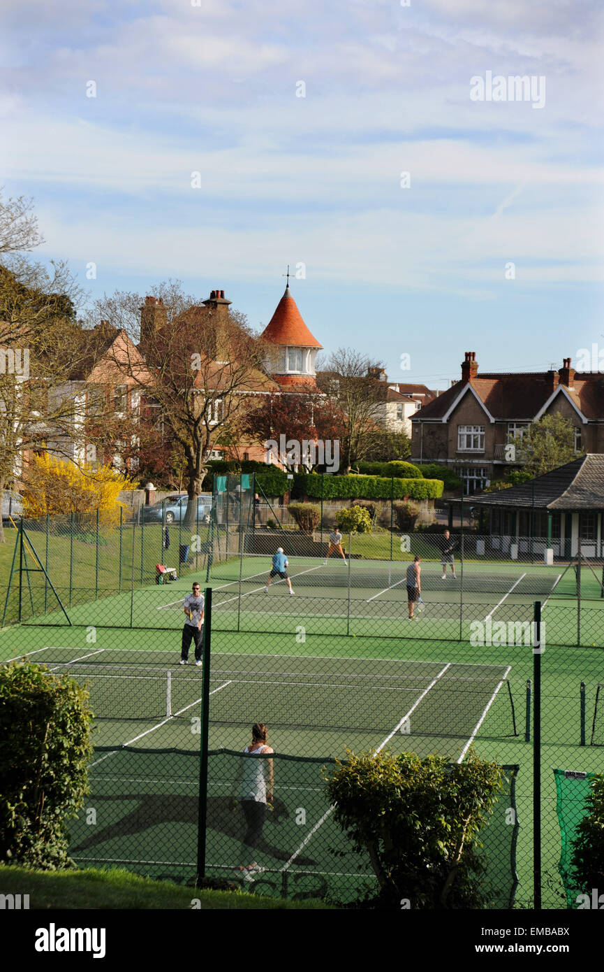 Brighton Sussex UK - Tennis players enjoy the lovely weather on the ...