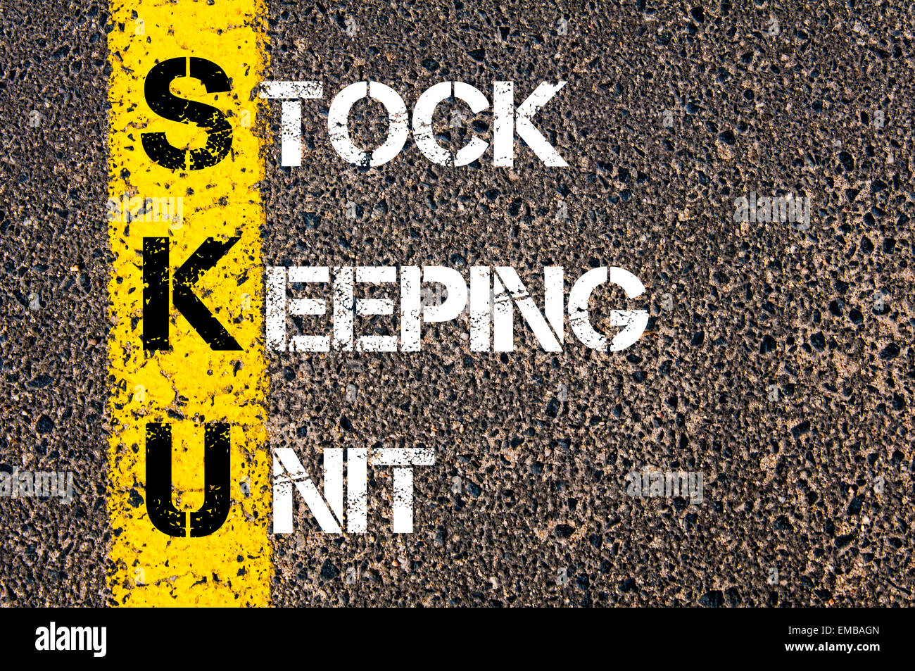 Business Acronym SKU as Stock Keeping Unit. Yellow paint line on the ...