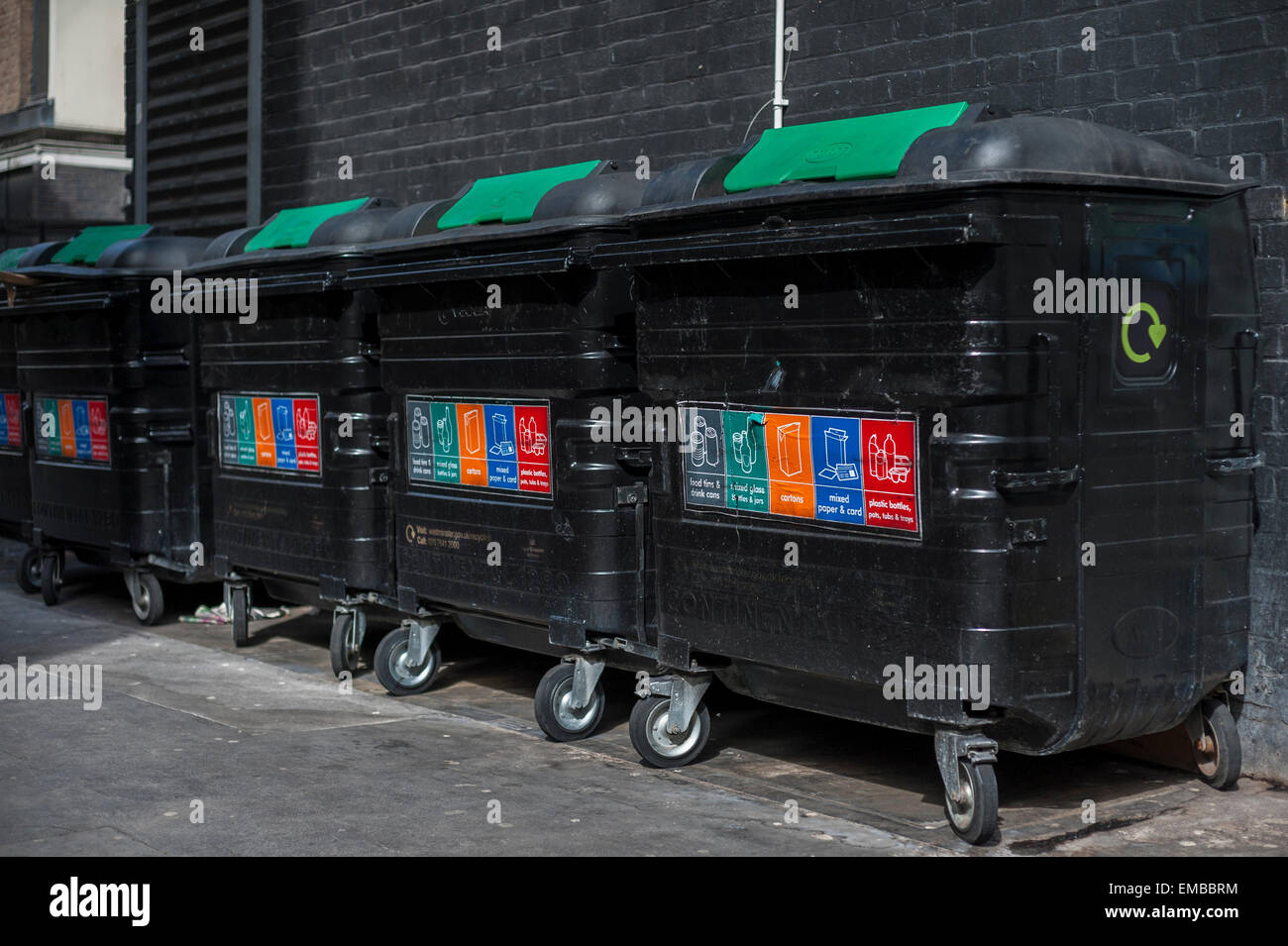 Soho, London, UK. 2 April 2015. A line of refuse / recycling bins Stock ...