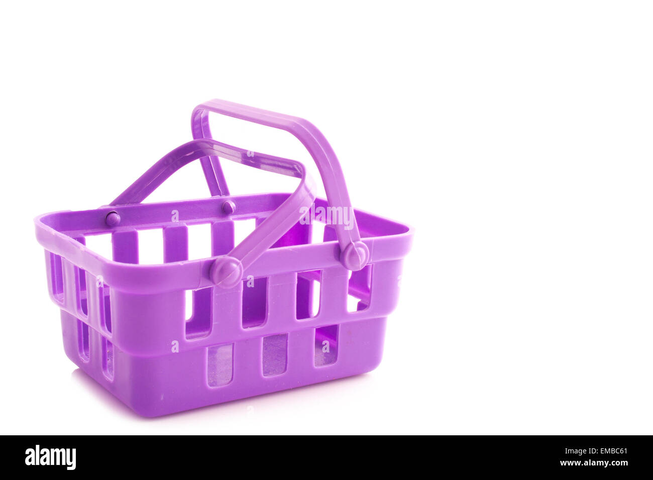 Purple shopping basket isolated on a white background Stock Photo - Alamy