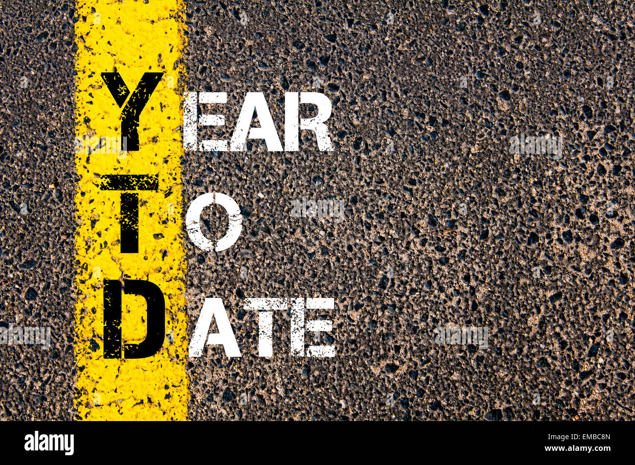 Business Acronym YTD as Year to Date. Yellow paint line on the road ...