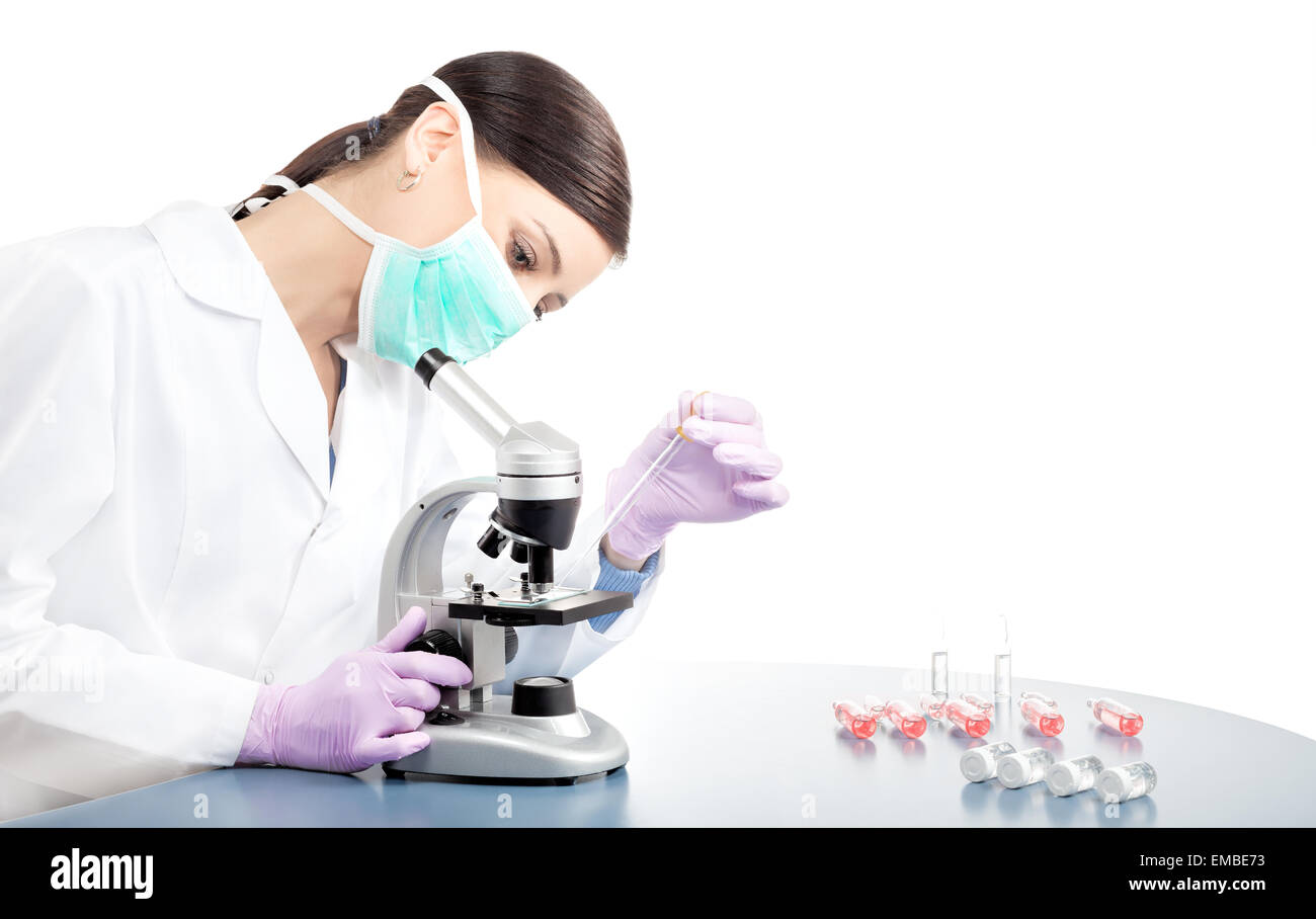 Woman microscope laboratory mask hi-res stock photography and images ...