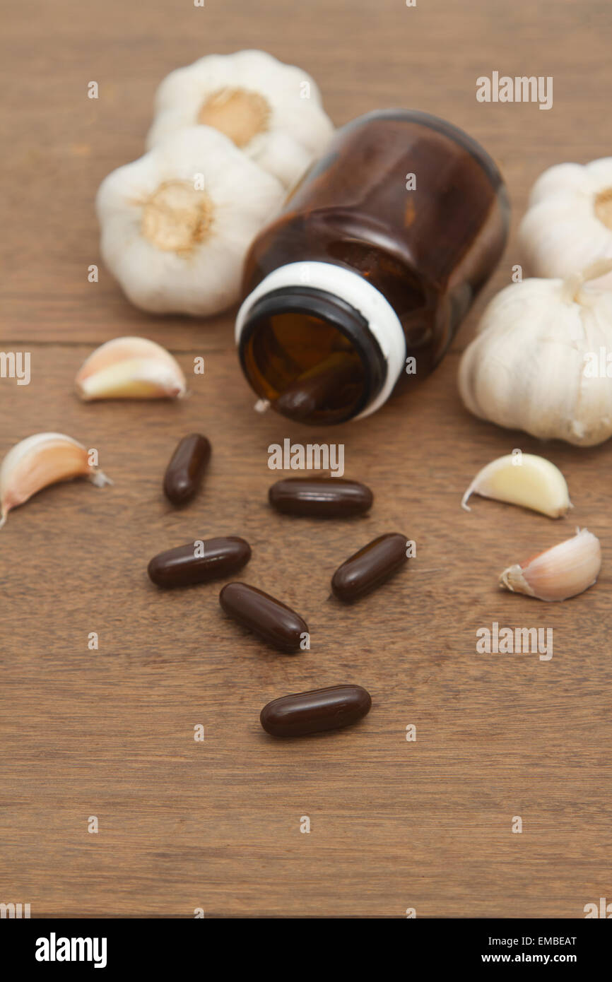 Garlic herbal supplement pills , alternative medicine Stock Photo - Alamy