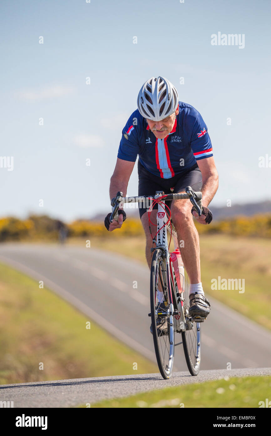 An elderly male cyclist competes in the New Forest Wiggle Sportive ...