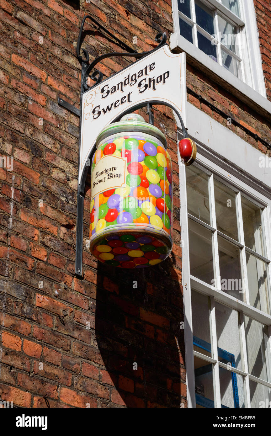 A sweet jar sign for the Sandgate Sweet Shop, on Sandgate in Whitby ...